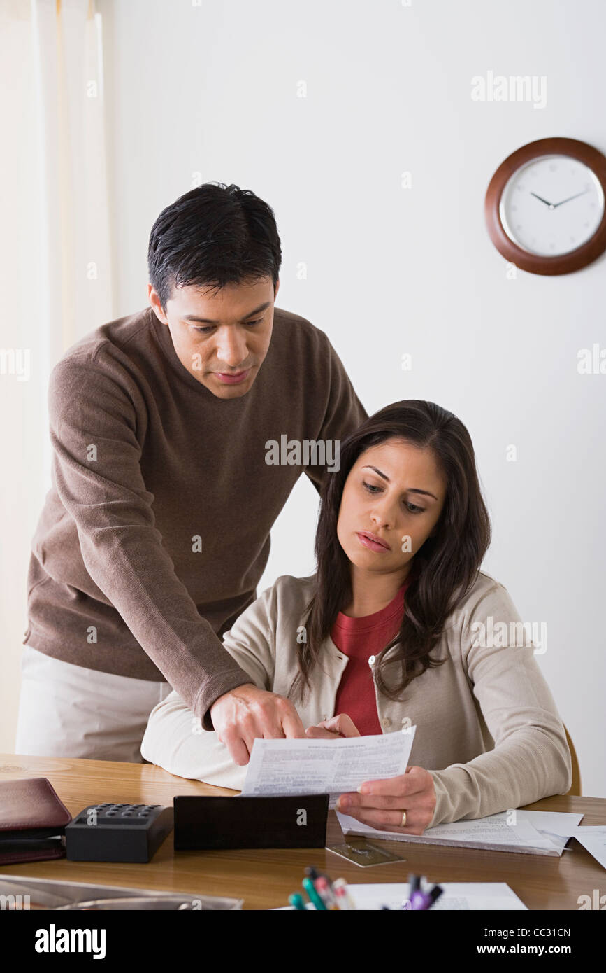 USA, California, Los Angeles, Couple doing paperwork Stock Photo - Alamy
