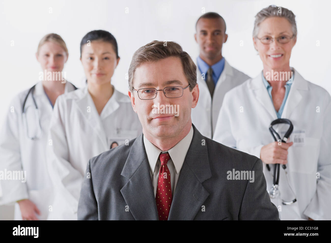Five doctors looking camera hi-res stock photography and images - Alamy