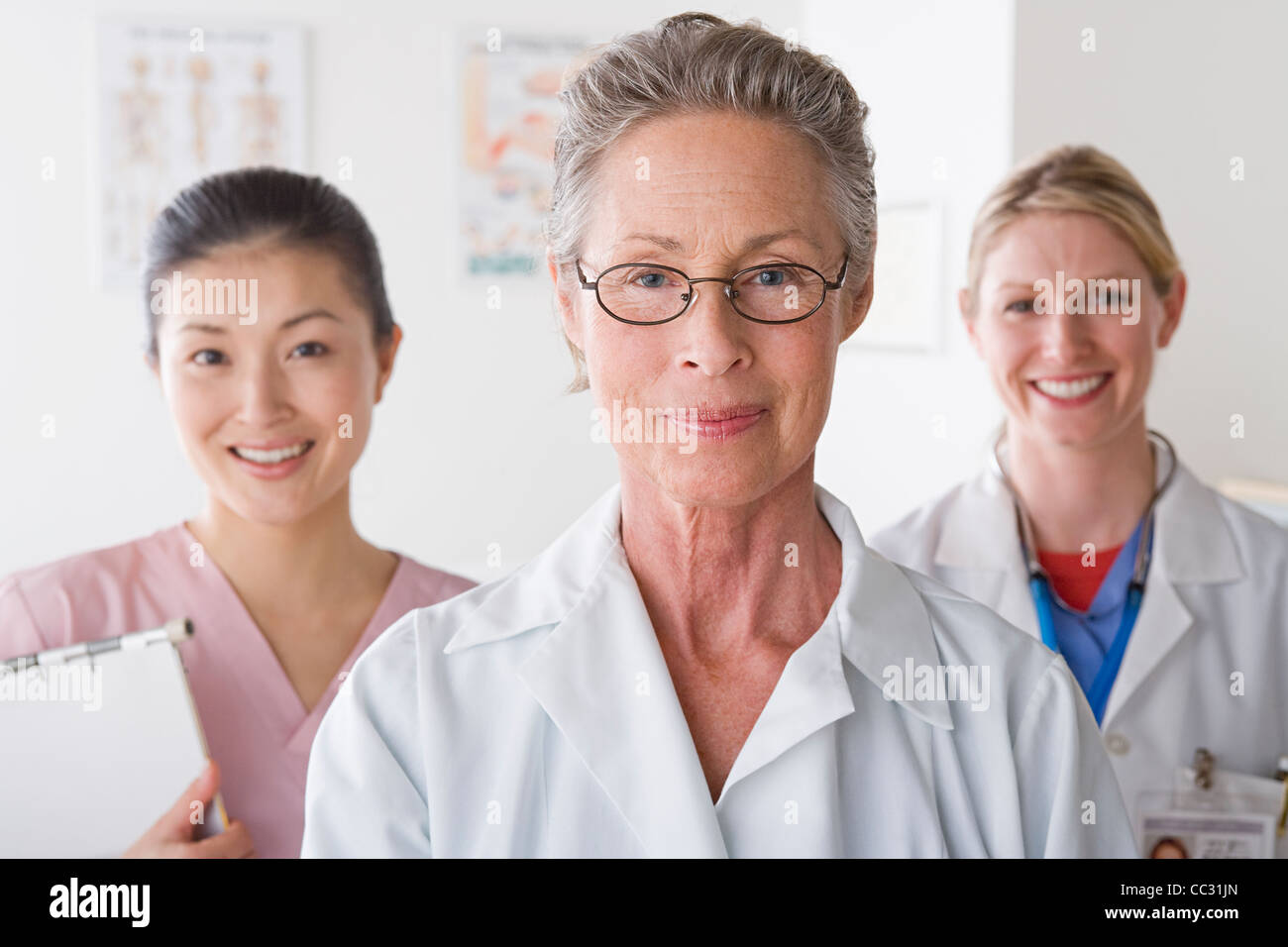 USA, California, Los Angeles, Portrait of three smiling female doctors ...