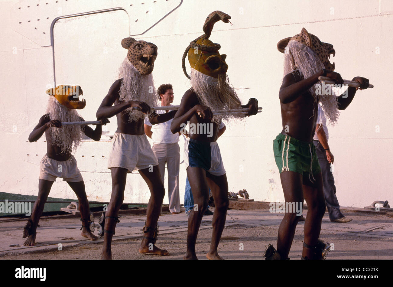 African masked dancers during festivities of the opening of the Great ...