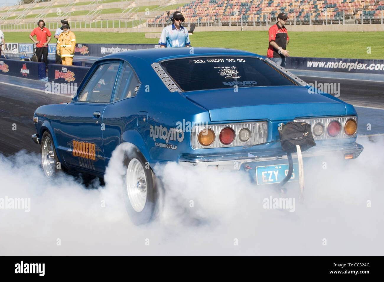 Australian Lee Sanders performs a tire smoking burning rubber burnout ...