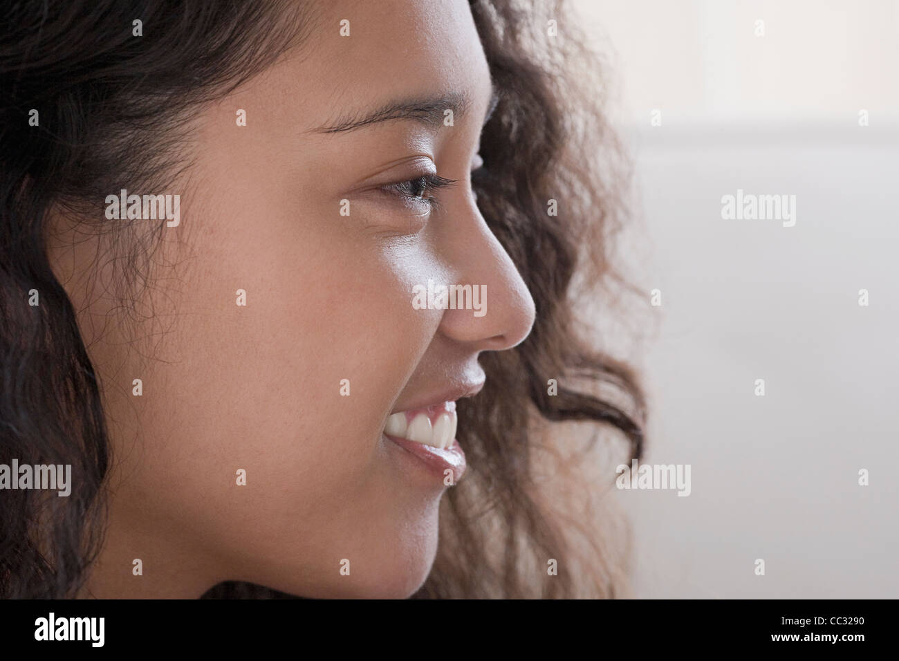USA, California, Los Angeles, Profile of young woman smiling Stock ...