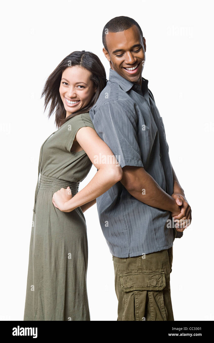 Studio portrait of young couple Stock Photo - Alamy