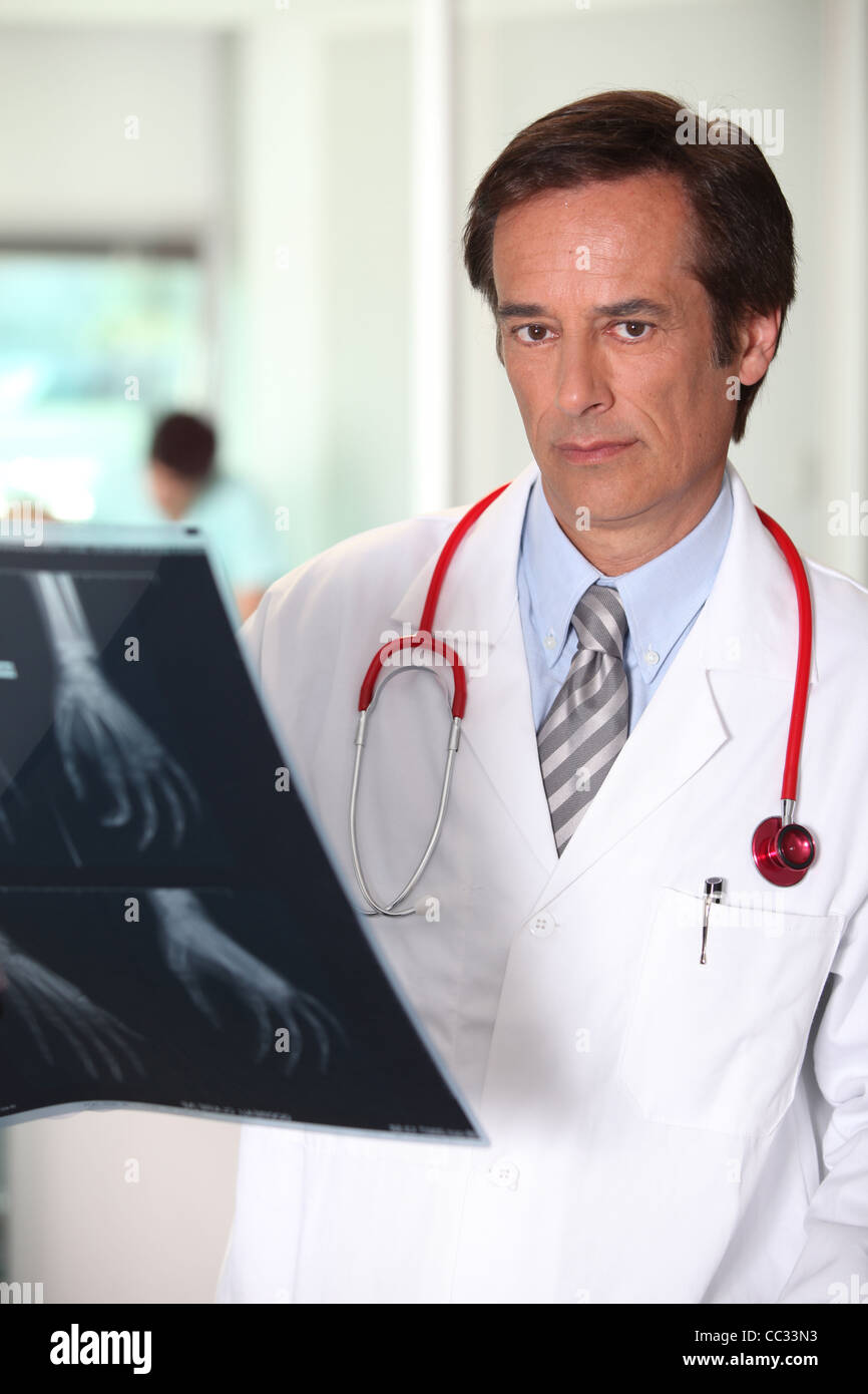 Doctor with stethoscope and X-ray Stock Photo - Alamy