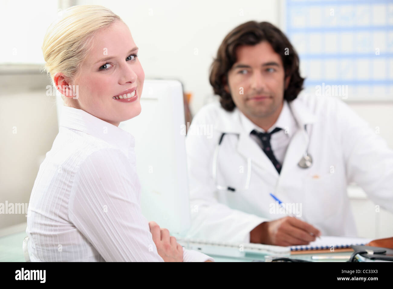 woman consulting her doctor Stock Photo - Alamy