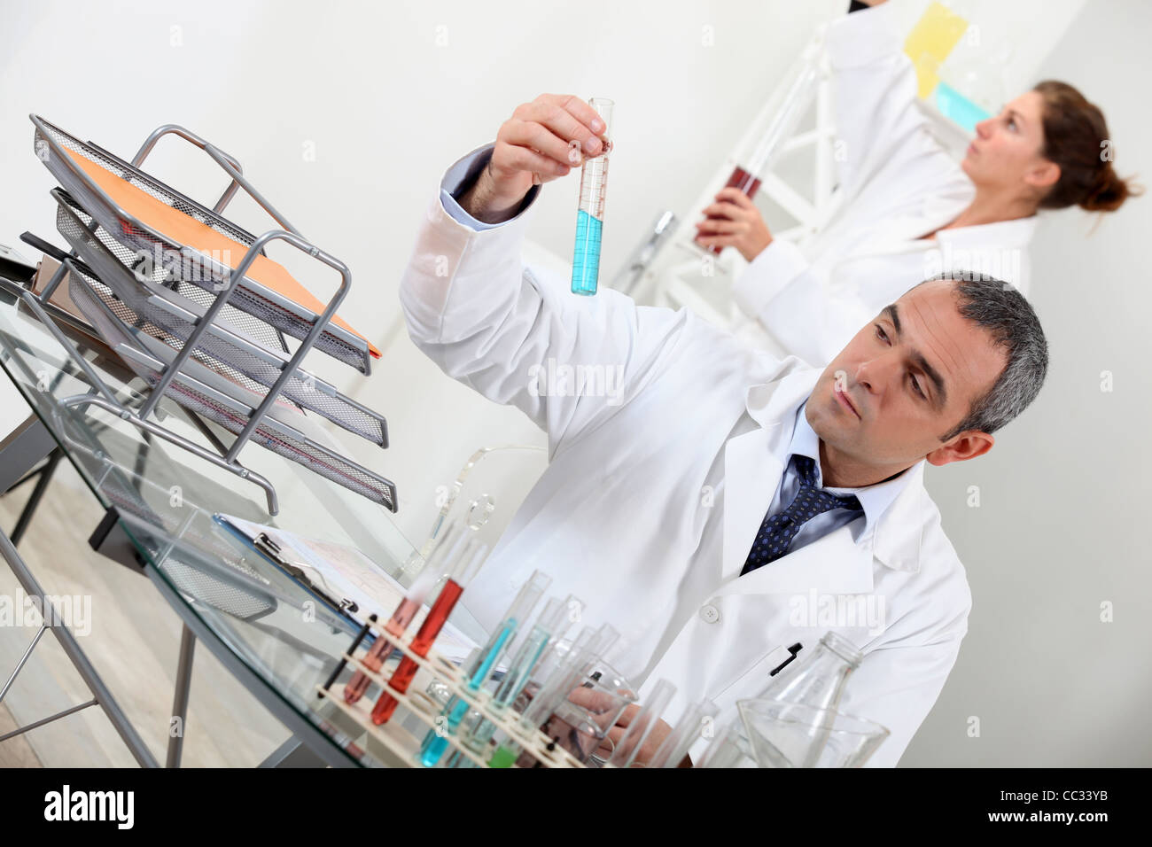People working in a laboratory Stock Photo - Alamy