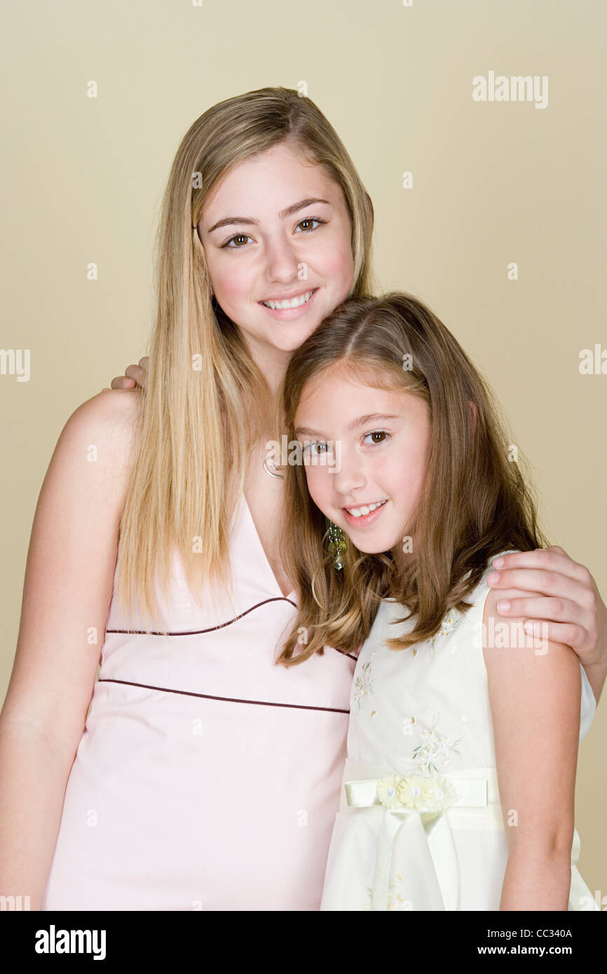 Portrait of two sisters (14-15, 8-9 Stock Photo - Alamy