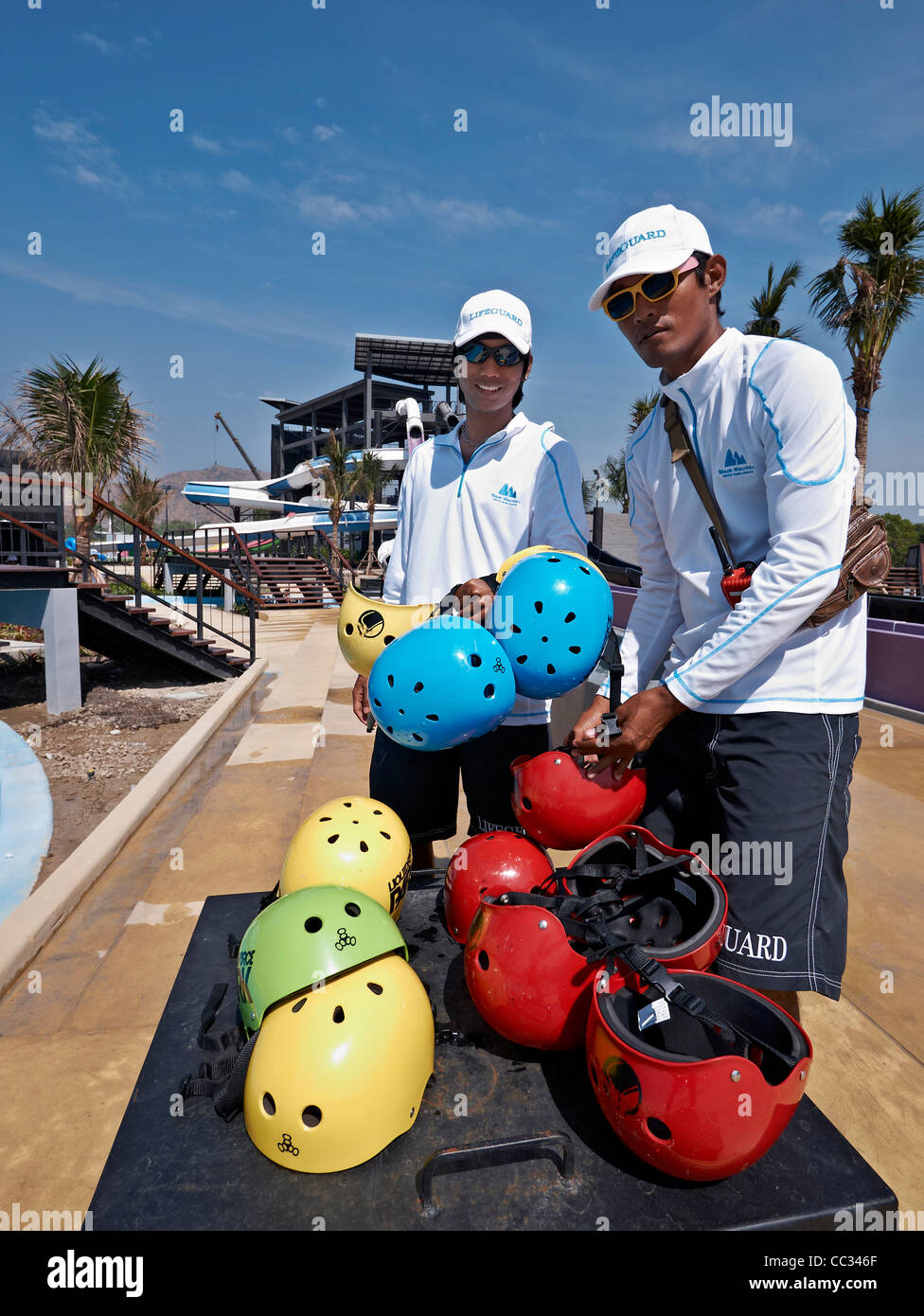 Lifeguards and customer safety helmets at a water theme park venue ...