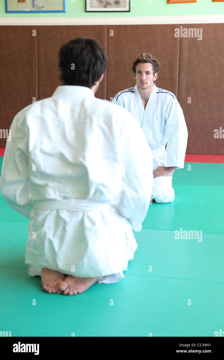 Men at the start of a judo match Stock Photo - Alamy
