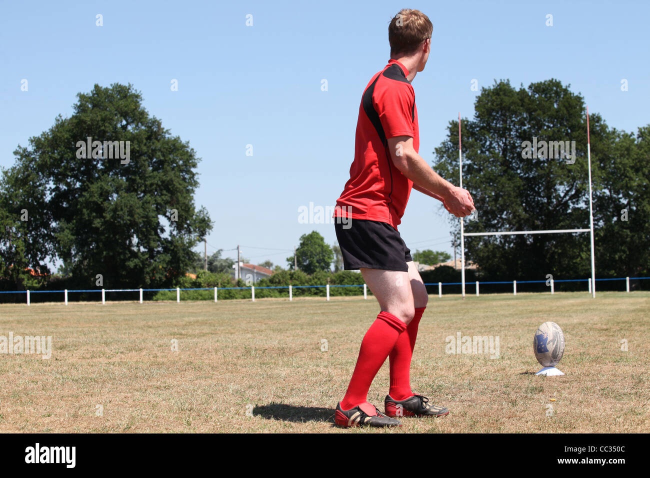 A rugbyman practicing his kick Stock Photo - Alamy