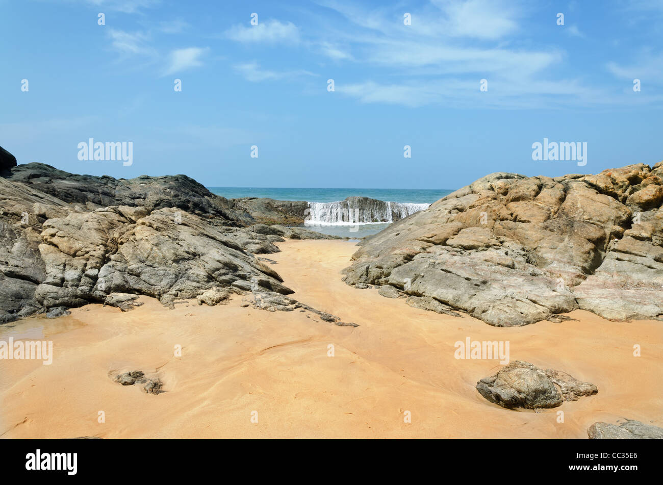 beautiful stones in the waves on ocean coast Stock Photo - Alamy