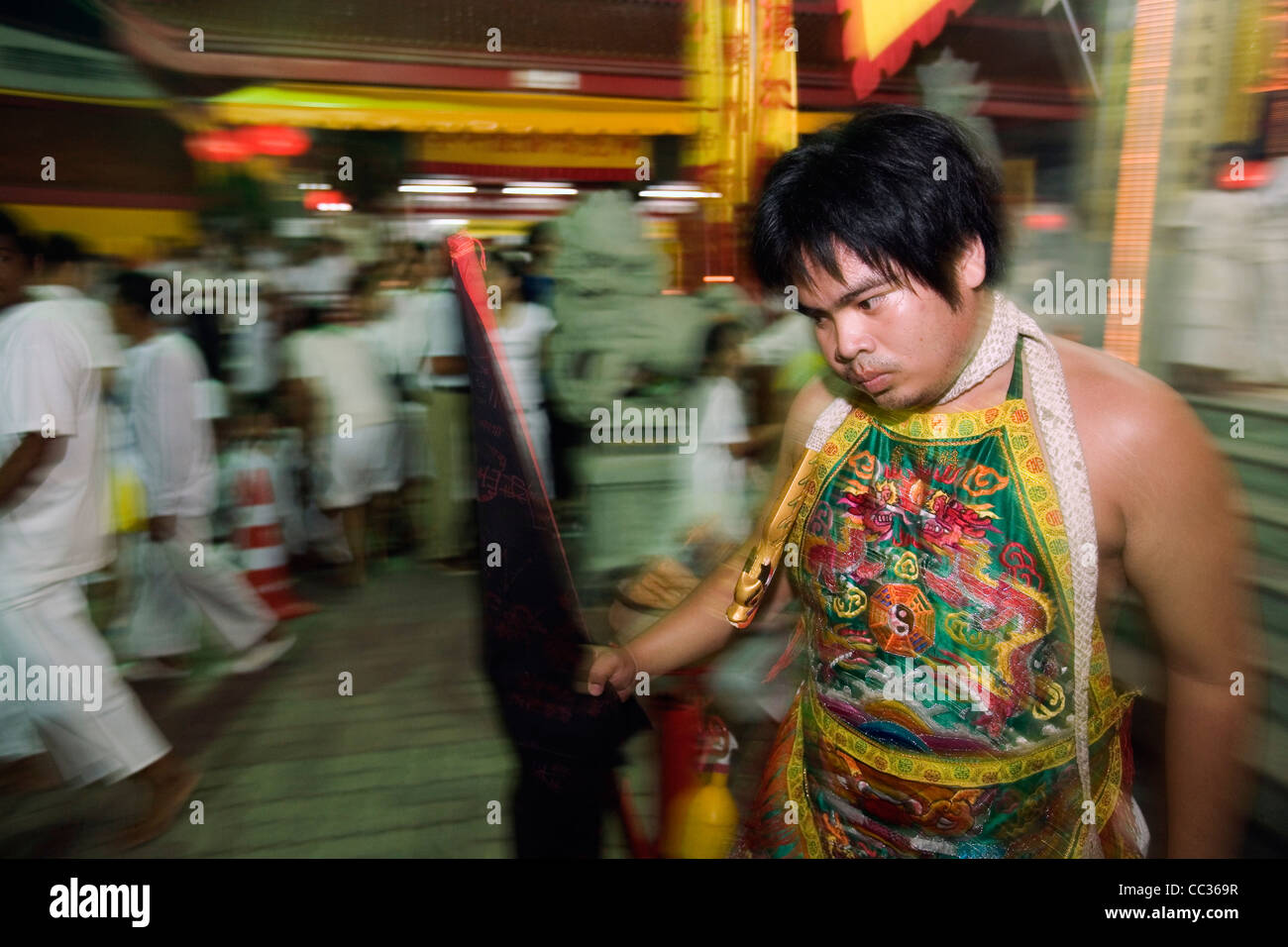 A Ma-Thong (religious devotee) goes into a trance as his body is taken ...