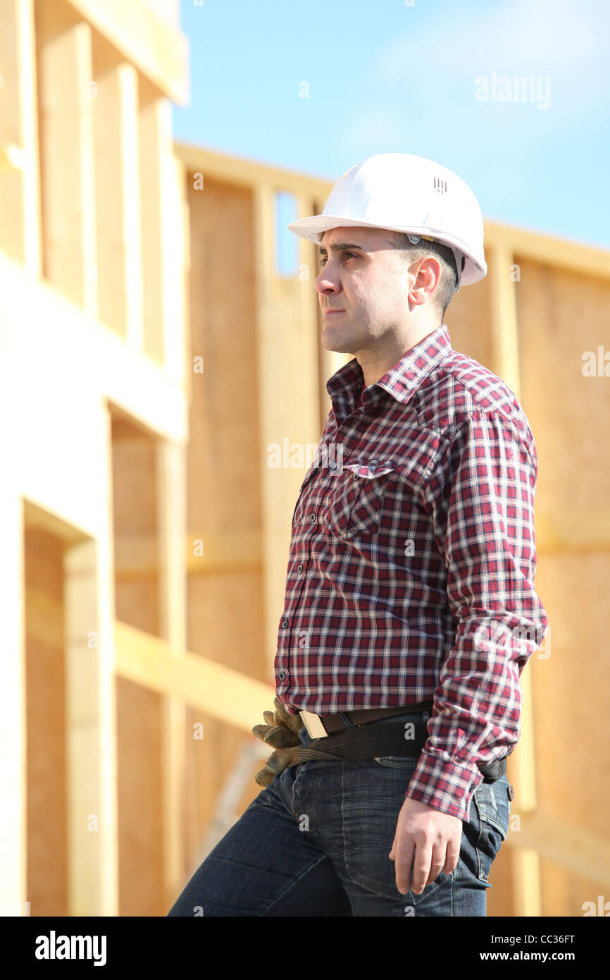 craftsman building a wooden house Stock Photo - Alamy