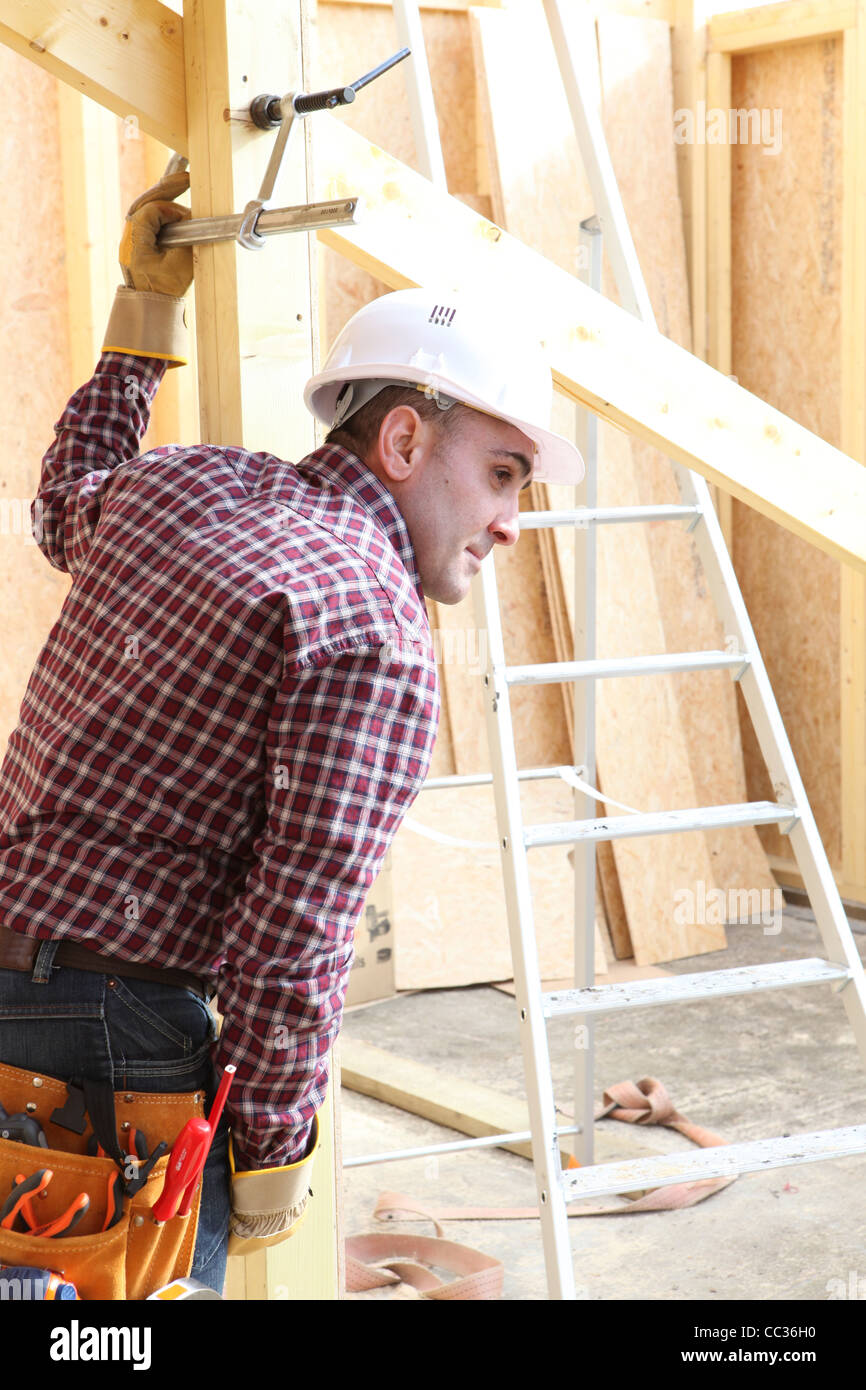 woodworker on a construction site Stock Photo - Alamy