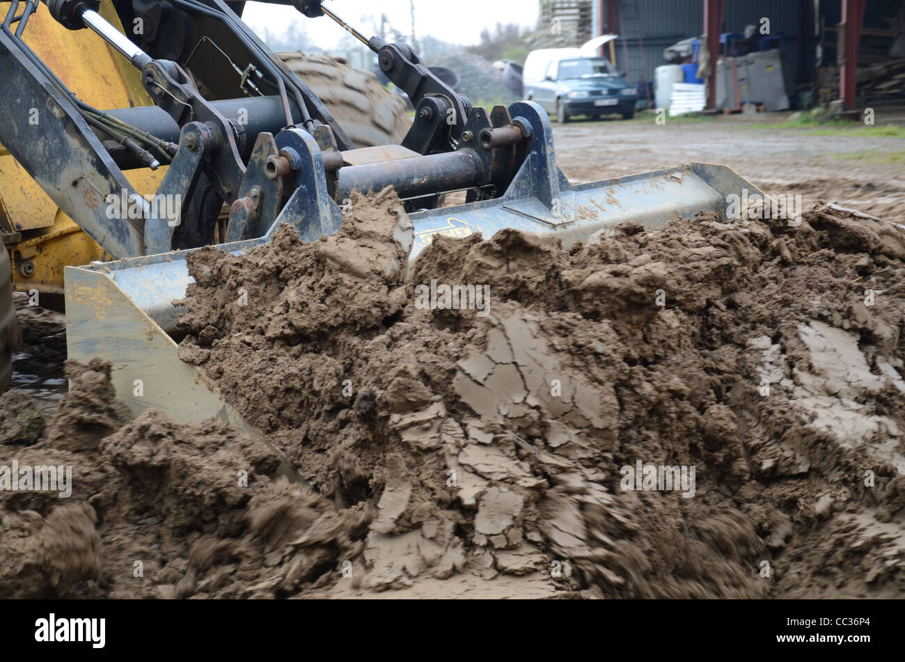 Work with excavator and soil Stock Photo - Alamy