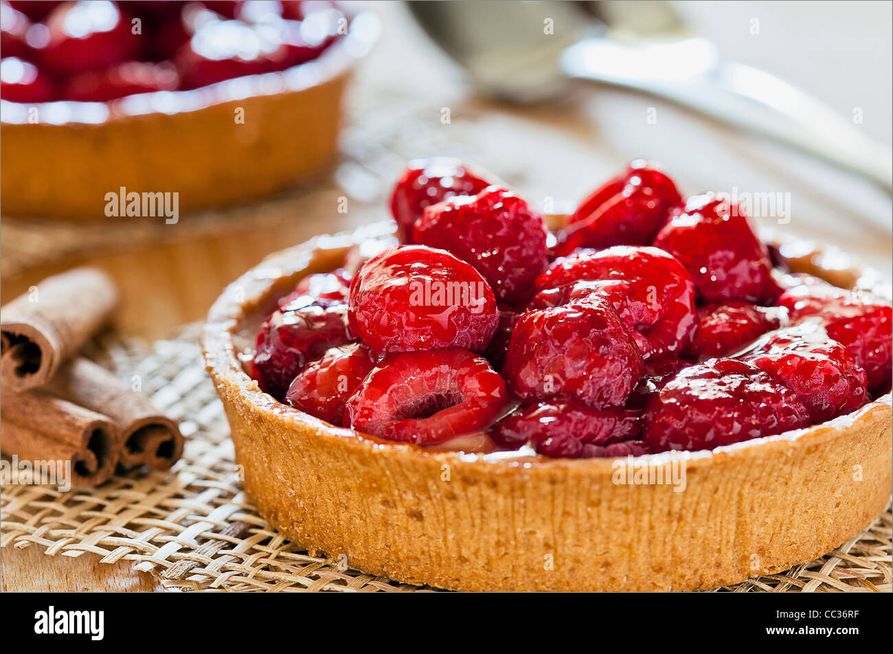 Photograph of two freshly made raspberry pies Stock Photo - Alamy