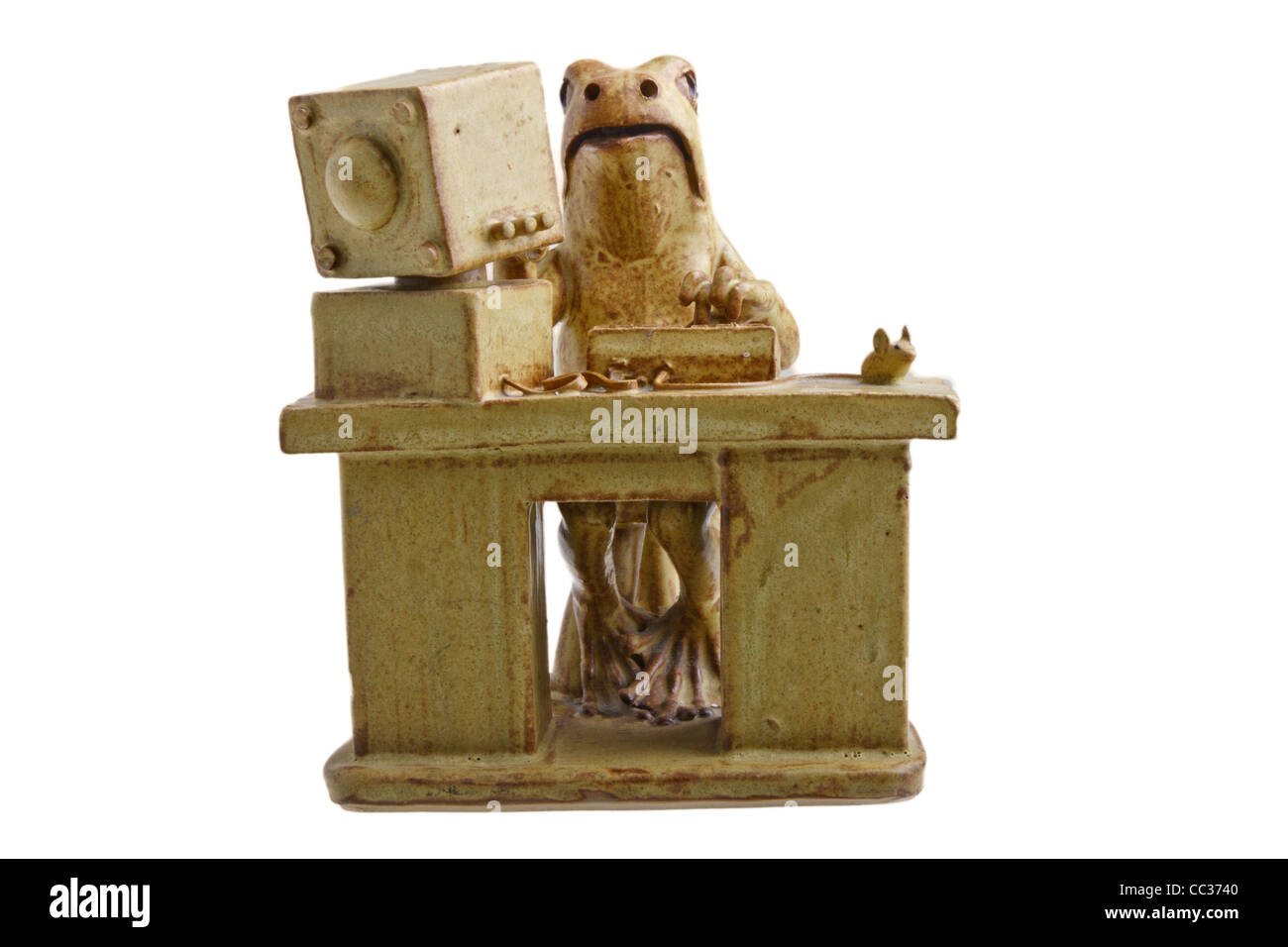 Pottery ornament depicting a frog using a computer Stock Photo - Alamy