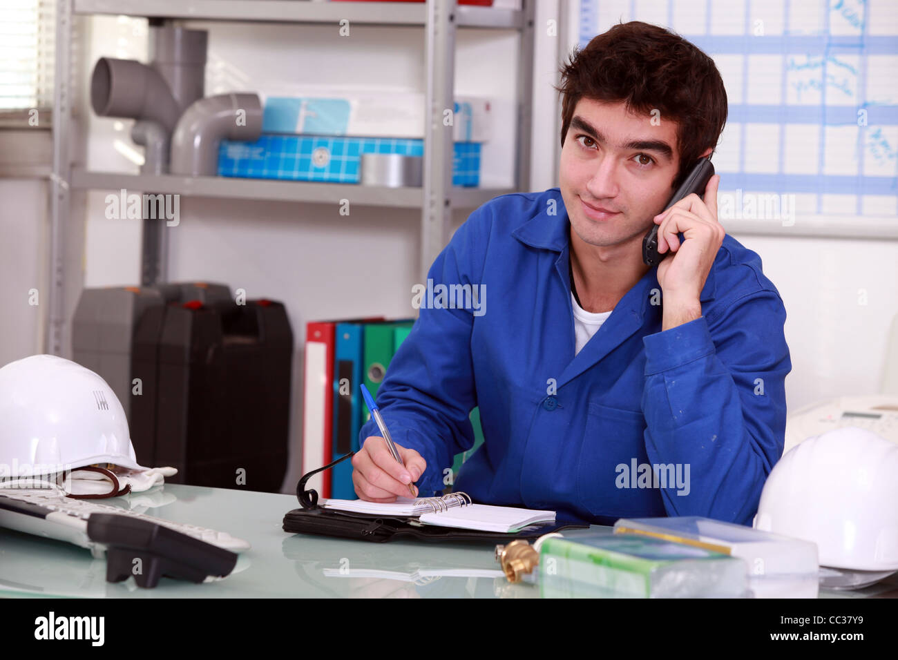 factory worker talking on the phone Stock Photo - Alamy