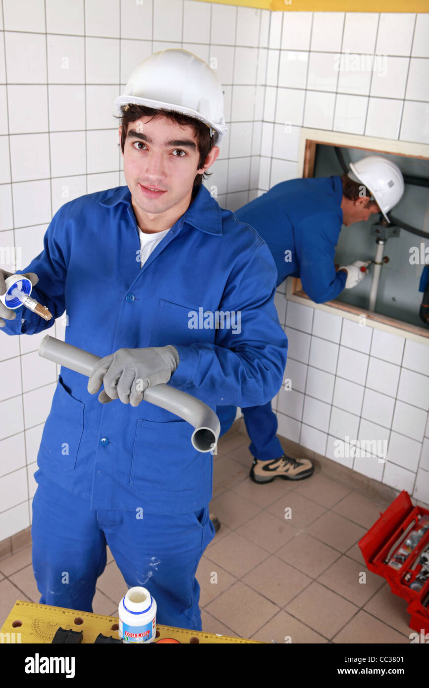 portrait of a young plumber Stock Photo - Alamy