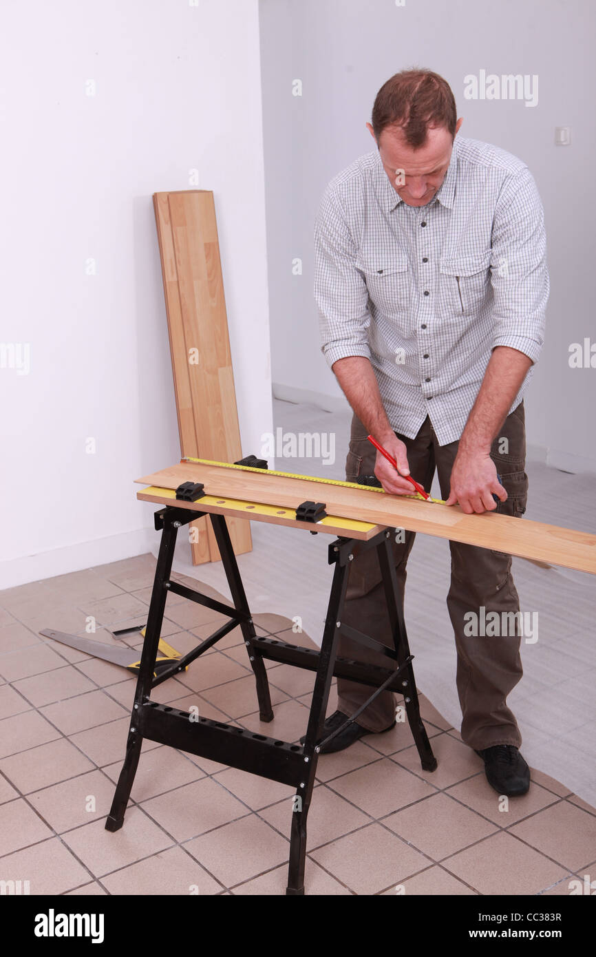 carpenter taking measurements Stock Photo - Alamy