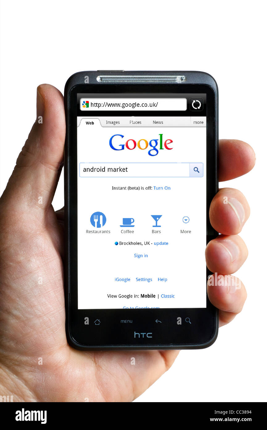 Performing a Google search on an HTC smartphone Stock Photo - Alamy