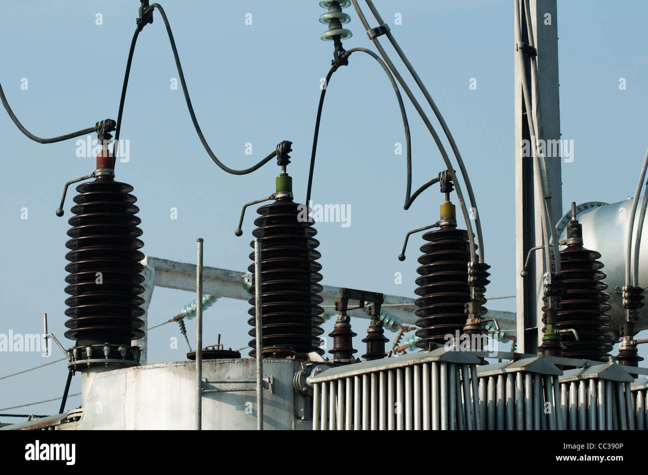High-voltage wires and transformers. Electrical distribution station ...