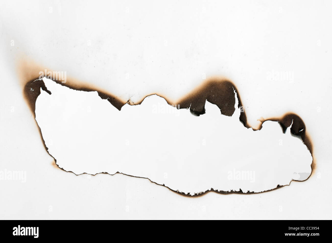 Burned paper and close up hole Stock Photo - Alamy