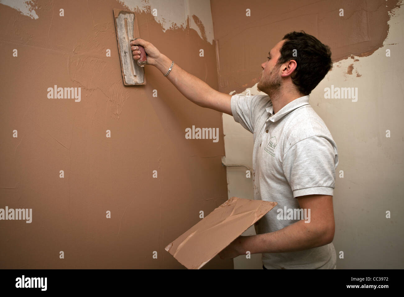 Plasterer at work Stock Photo - Alamy