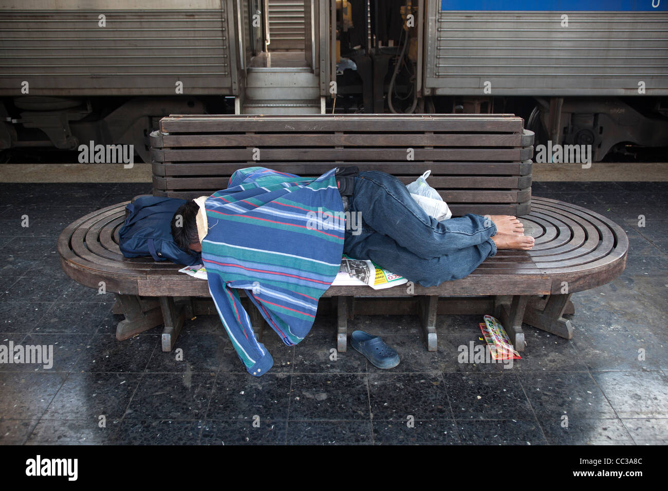 Man sleeping train seat thailand hi-res stock photography and images ...