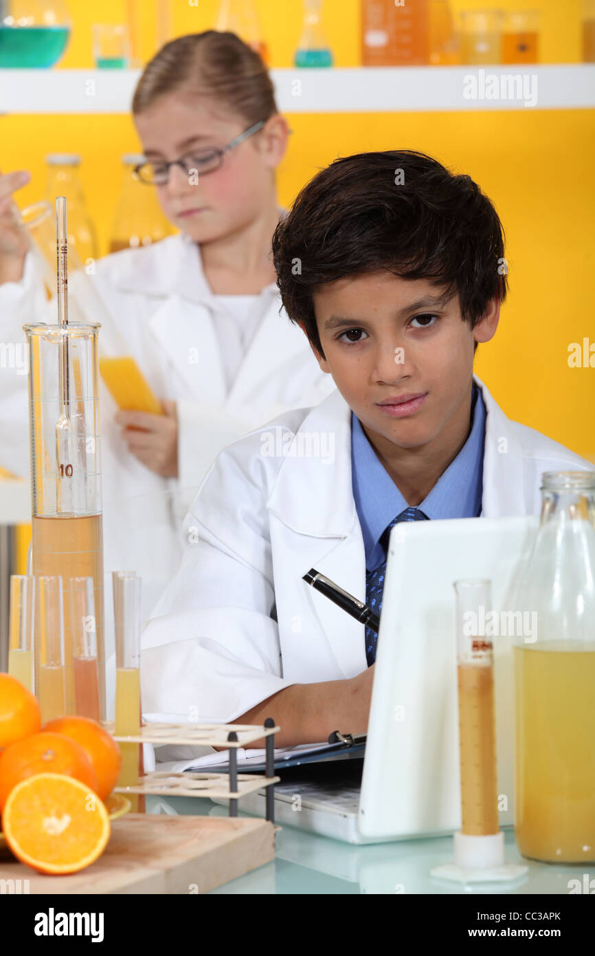 Little boy in chemistry class Stock Photo - Alamy