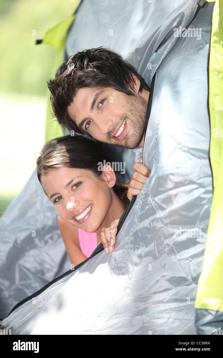 Peering out of tent hi-res stock photography and images - Alamy