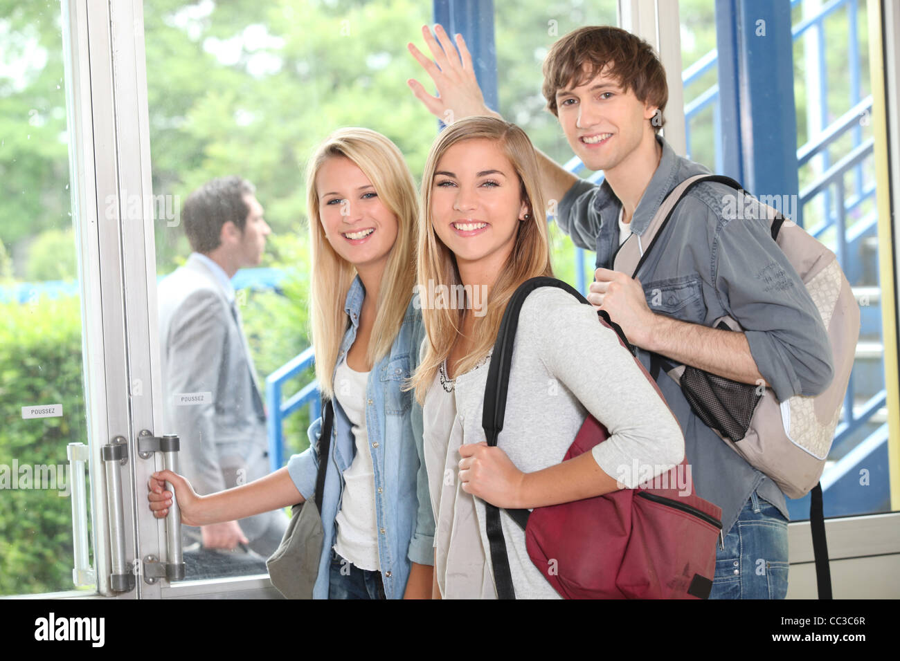 Group of students at college entrance Stock Photo - Alamy