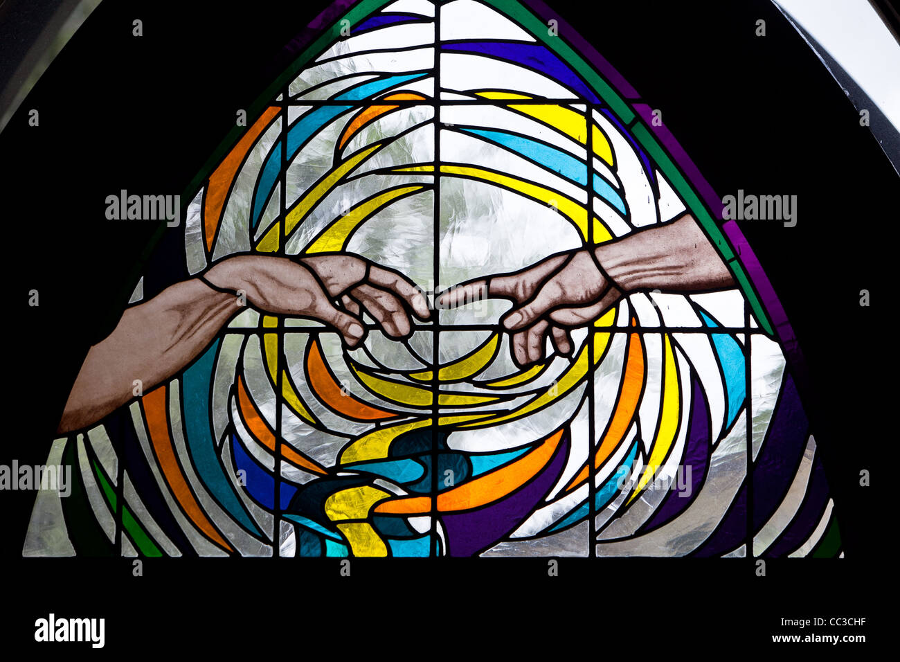 Touch of God - Creation of Man in a Stained Glass window Stock Photo ...