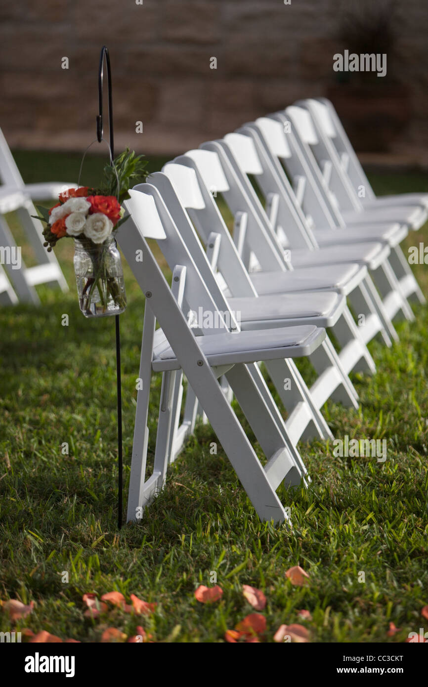 A row of chairs set up for a wedding ceremony Stock Photo - Alamy