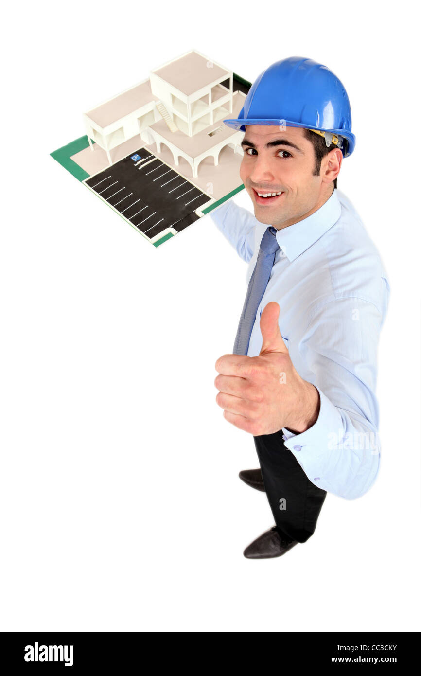 Male architect holding model housing Stock Photo - Alamy Male architect holding model housing Stock Photo - Alamy