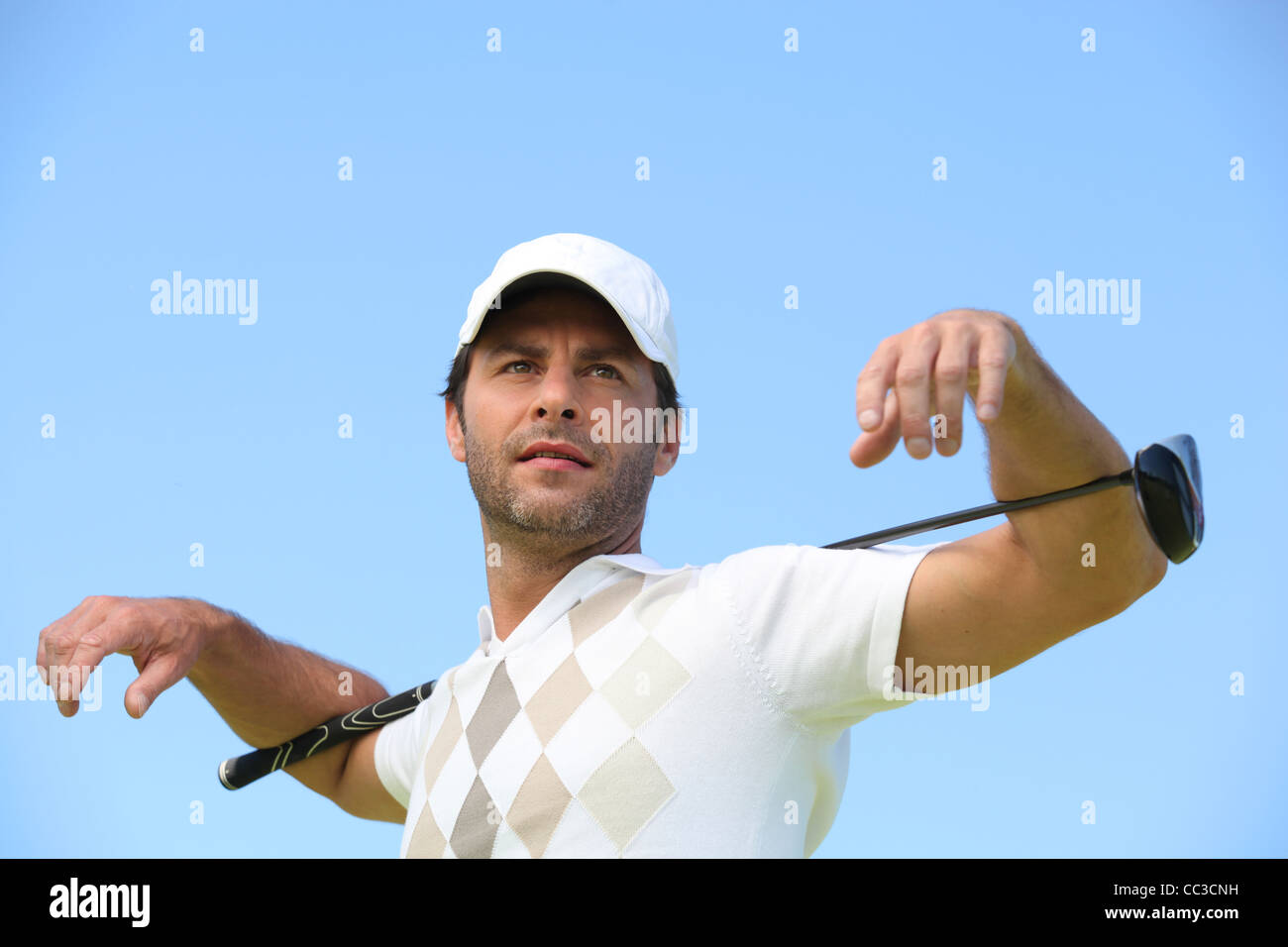 portrait of a man with golf club Stock Photo - Alamy