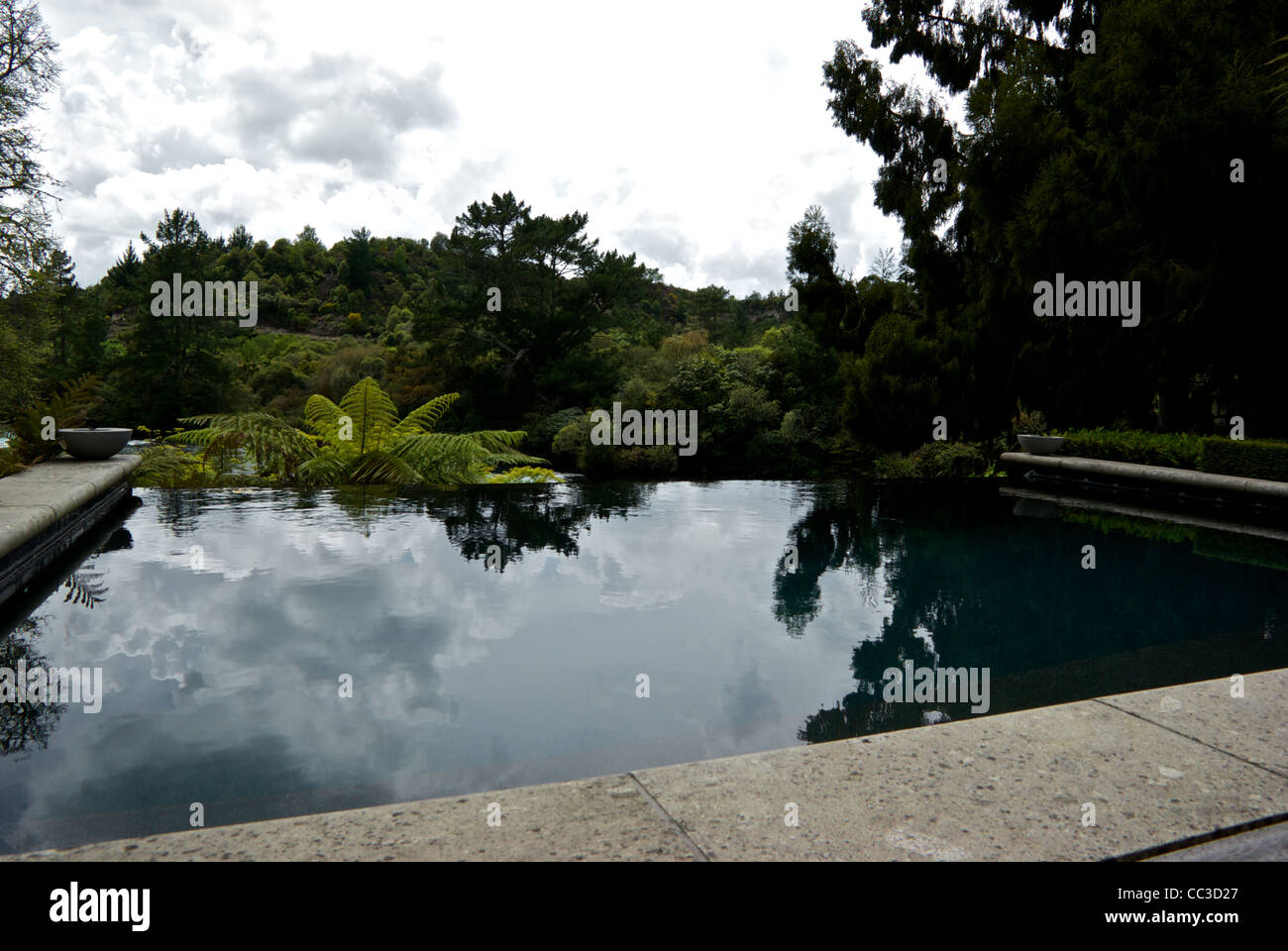 infinity swimming pool overlooking cascades Waikato River Huka Lodge ...