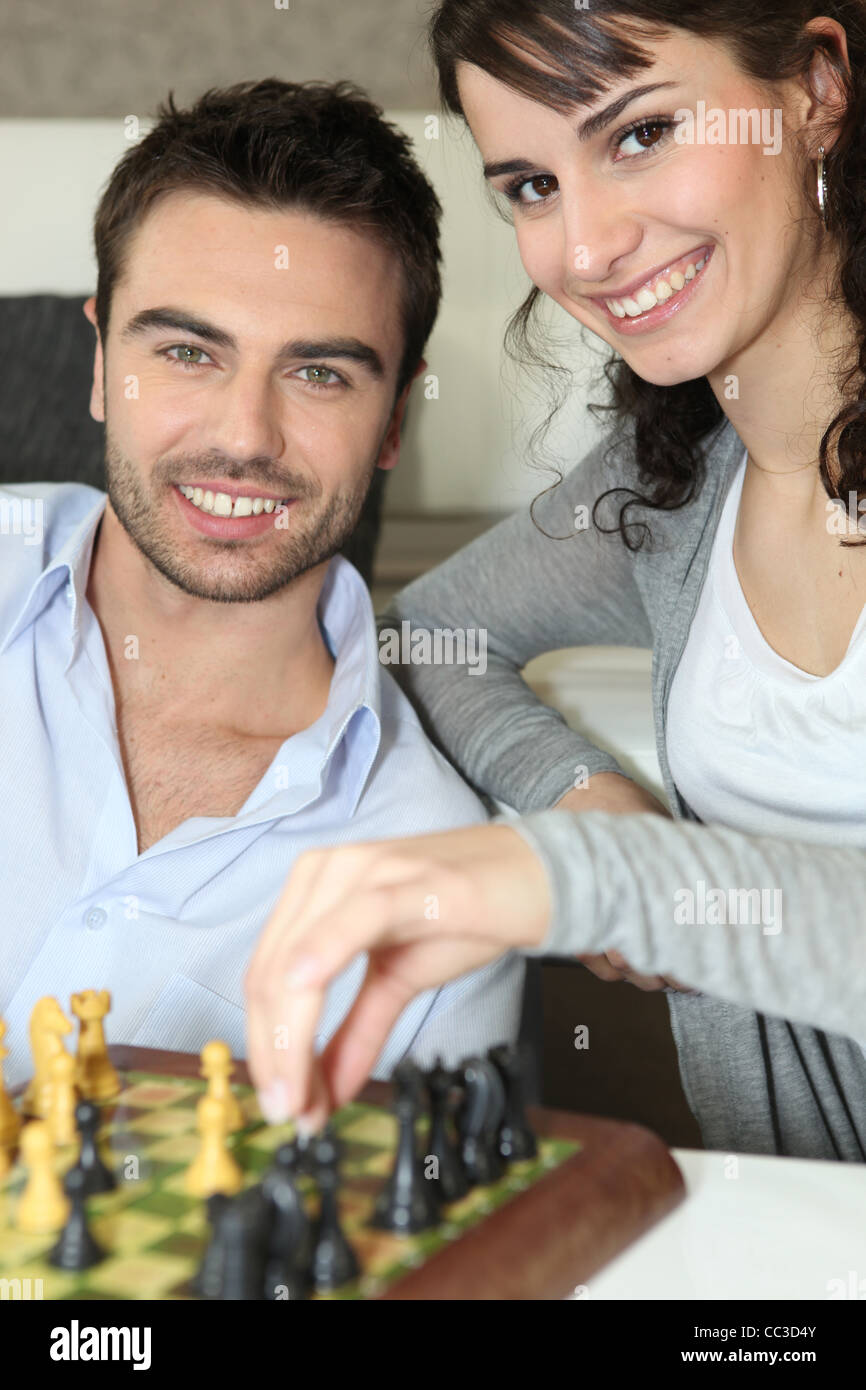 Chess set and hands hi-res stock photography and images - Alamy