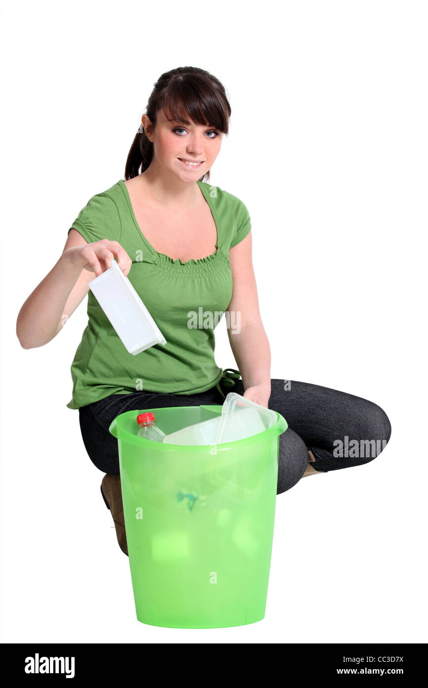 Woman recycling plastic Stock Photo - Alamy