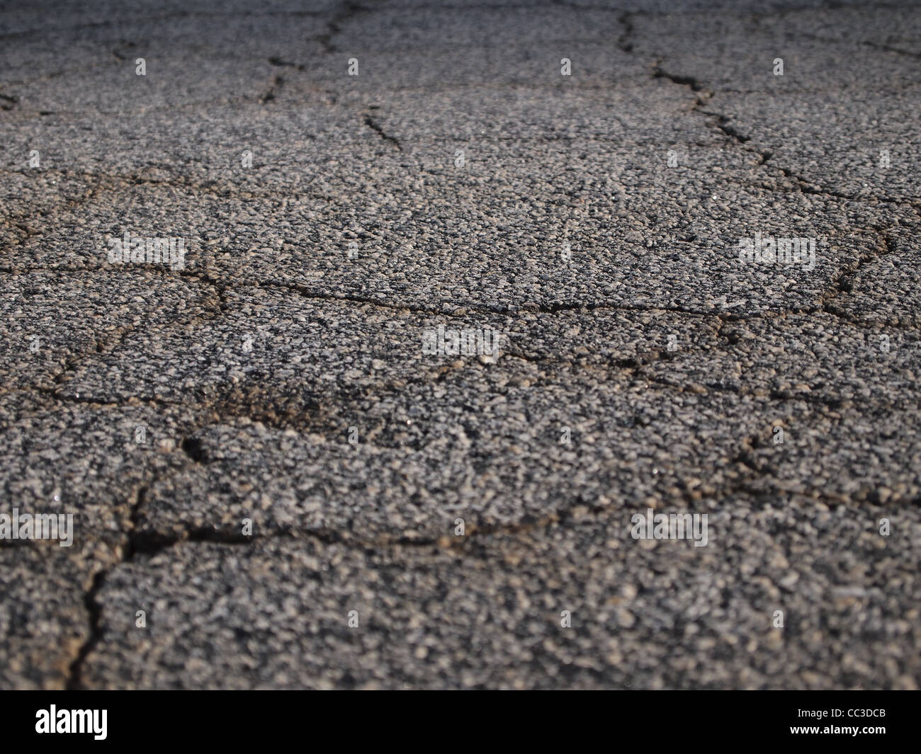 Cracked blacktop hi-res stock photography and images - Alamy