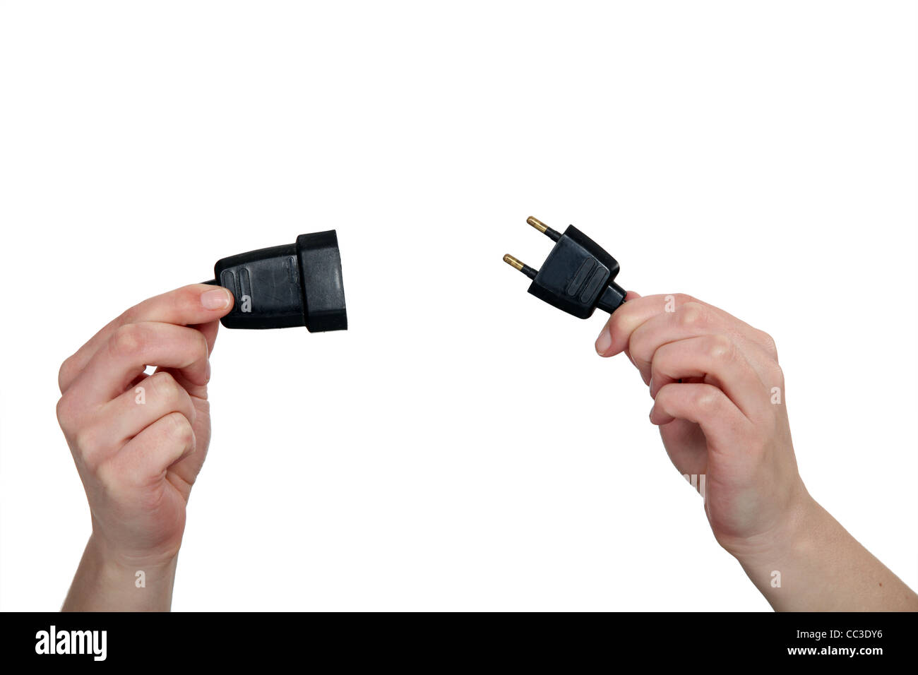 hands holding two prong plug Stock Photo - Alamy