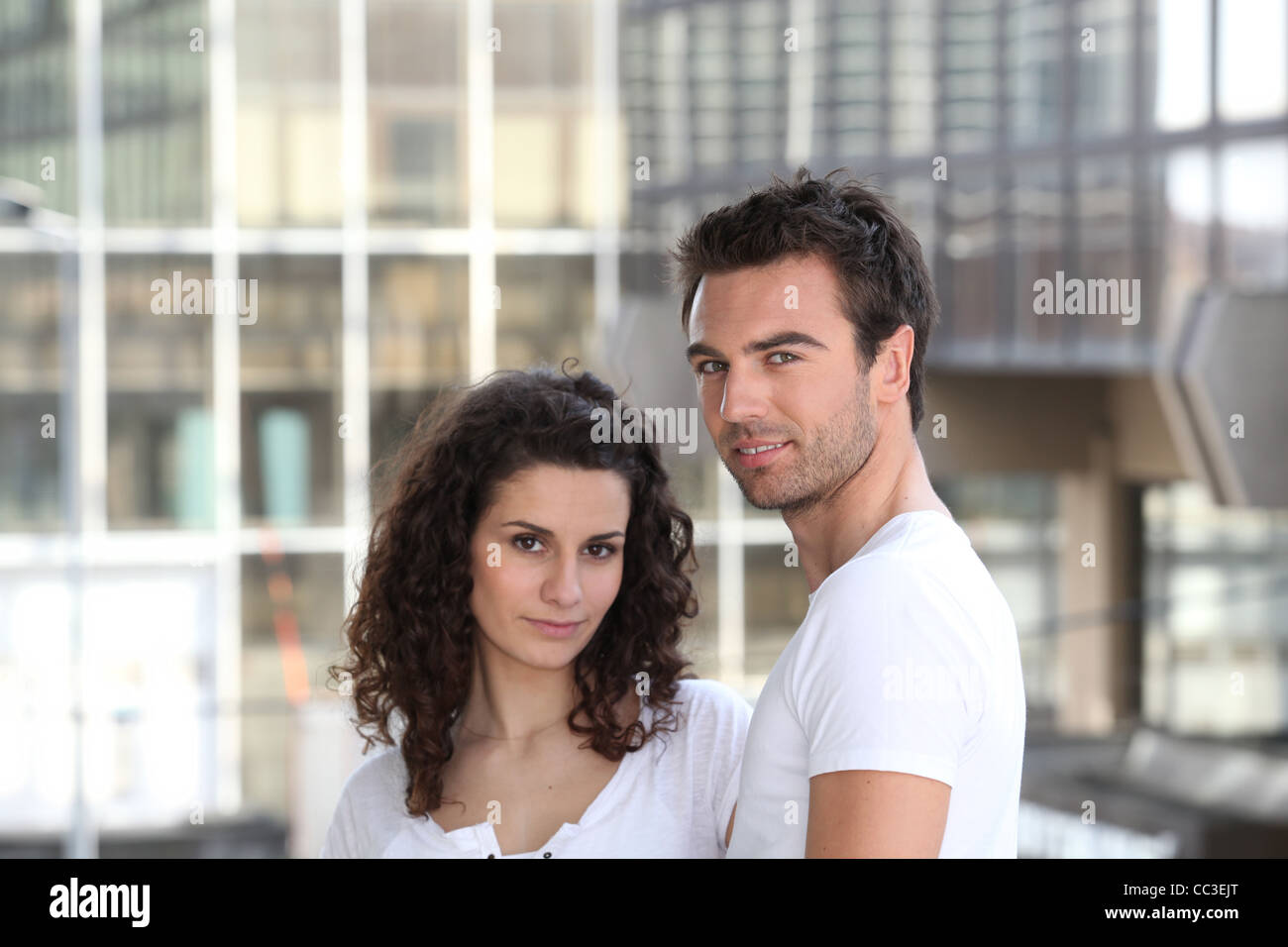 Tenants stood by high-rise housing Stock Photo - Alamy