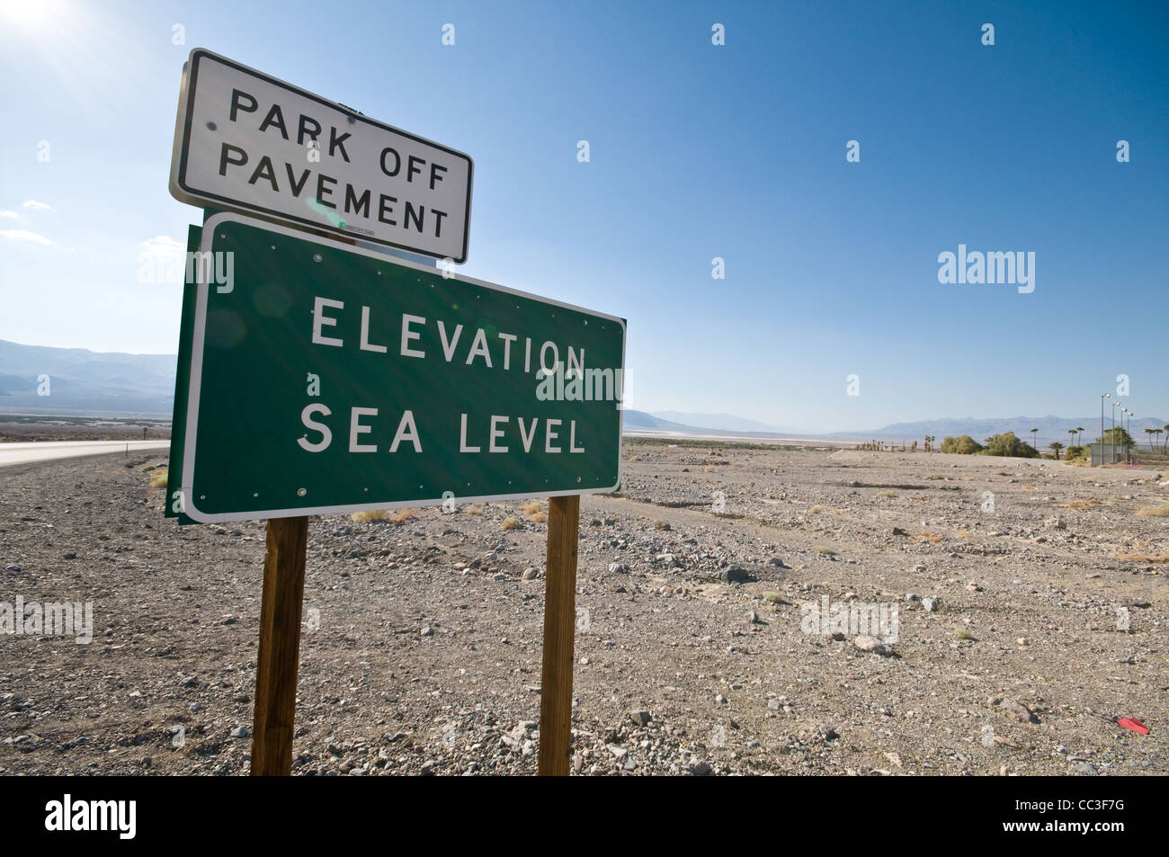 Sign in Death Valley saying PARK OFF PAVEMENT ELEVATION SEA LEVEL Stock ...