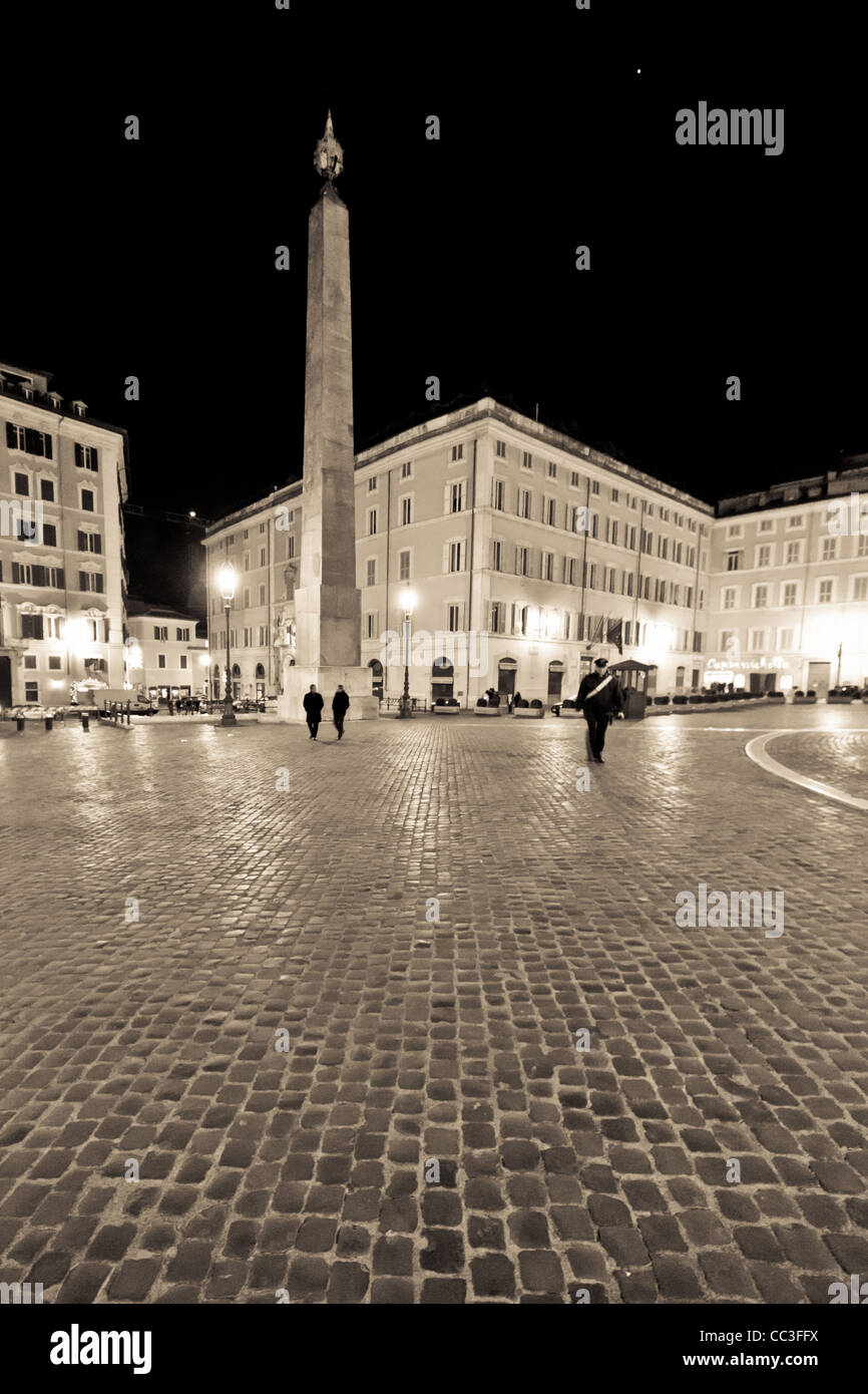An empty and deserted cobble stone piazza in Rome at night Stock Photo ...