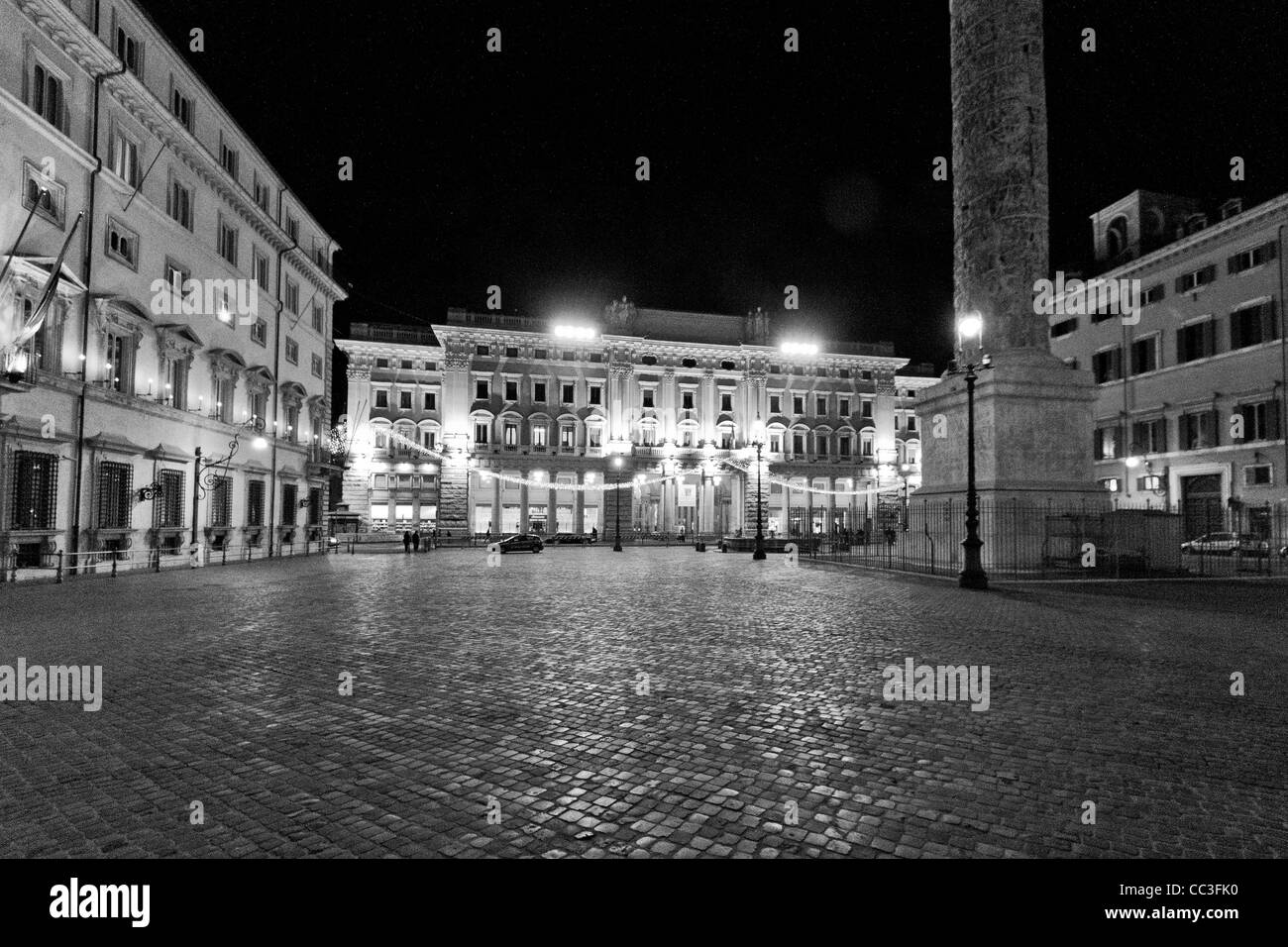 An empty and deserted cobble stone piazza in Rome at night Stock Photo ...