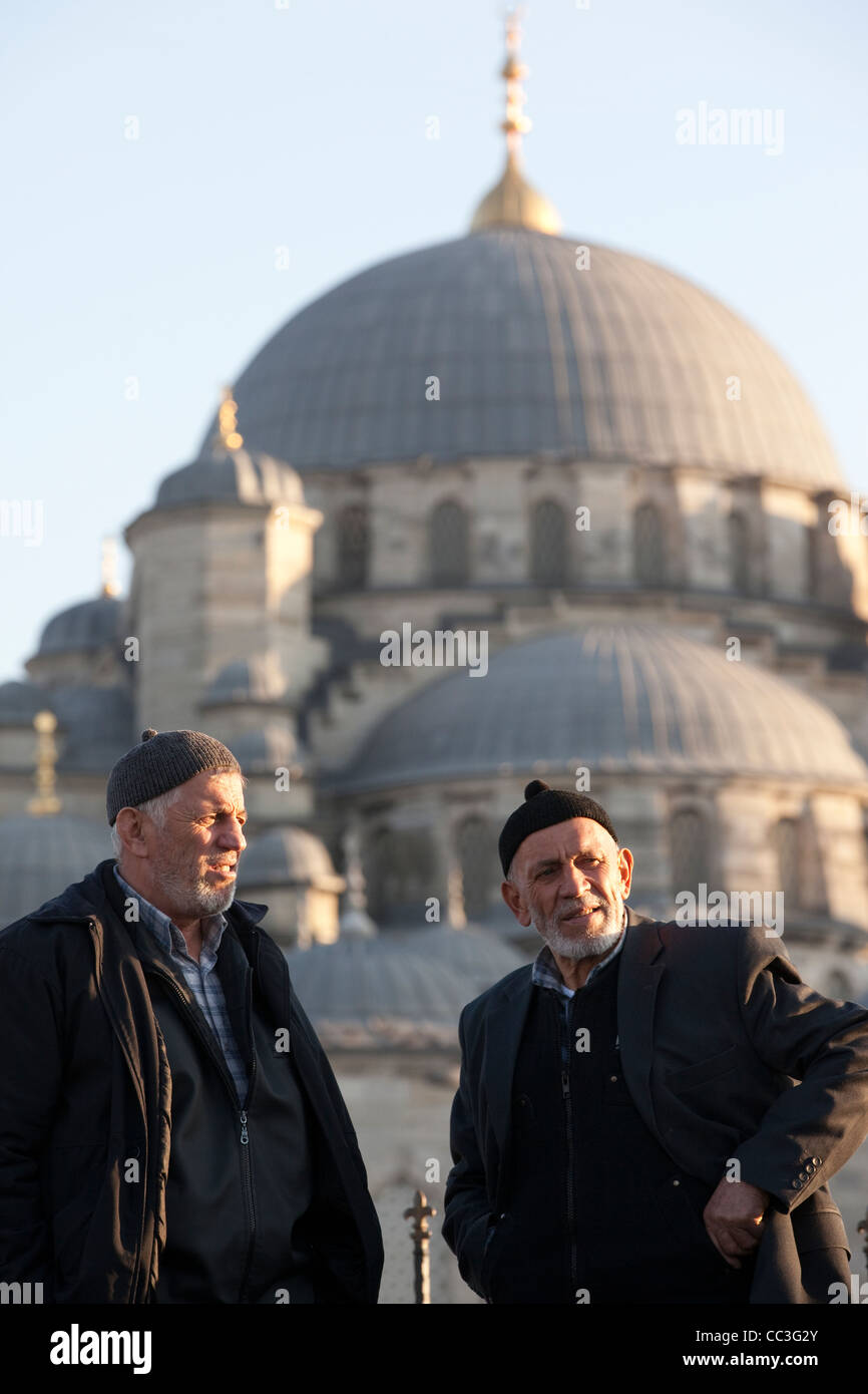 Islamic men in front of the Yeni Mosque, Istanbul, Turkey. Photo:Jeff ...