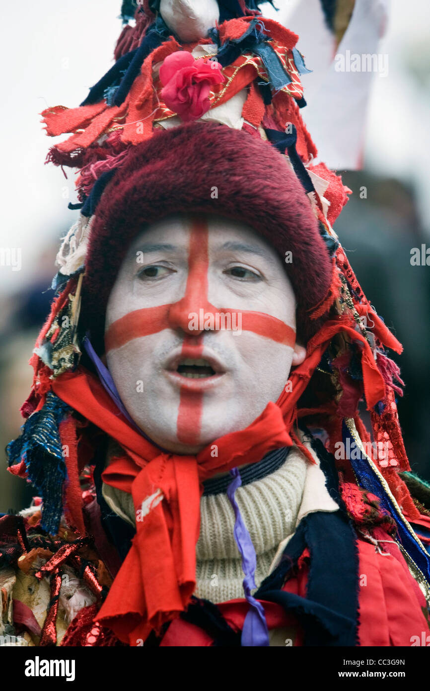 An actor dressed as St George fights in a traditional folklore play ...