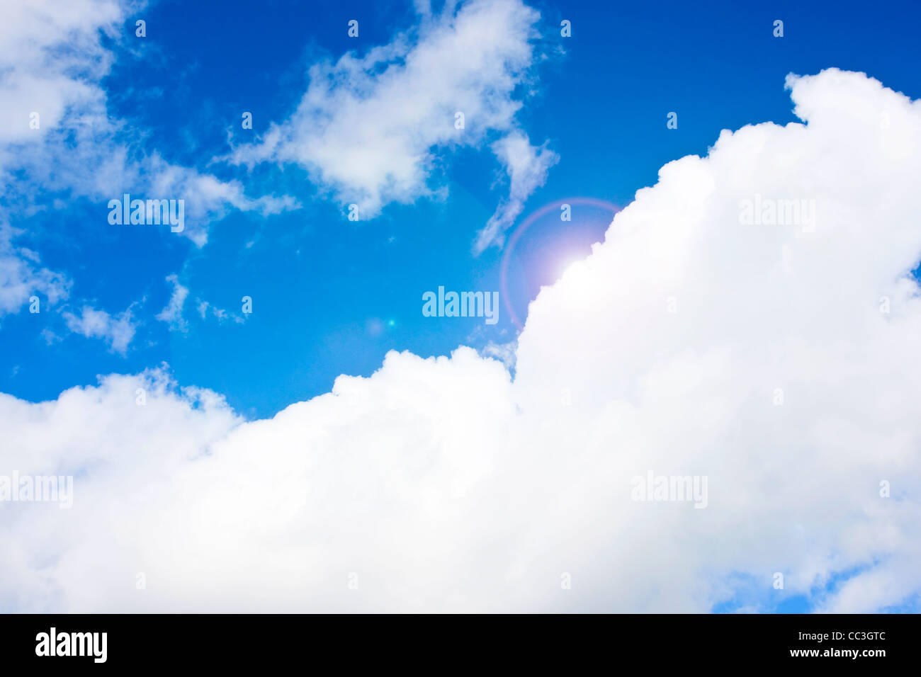 White clouds with sun Stock Photo - Alamy