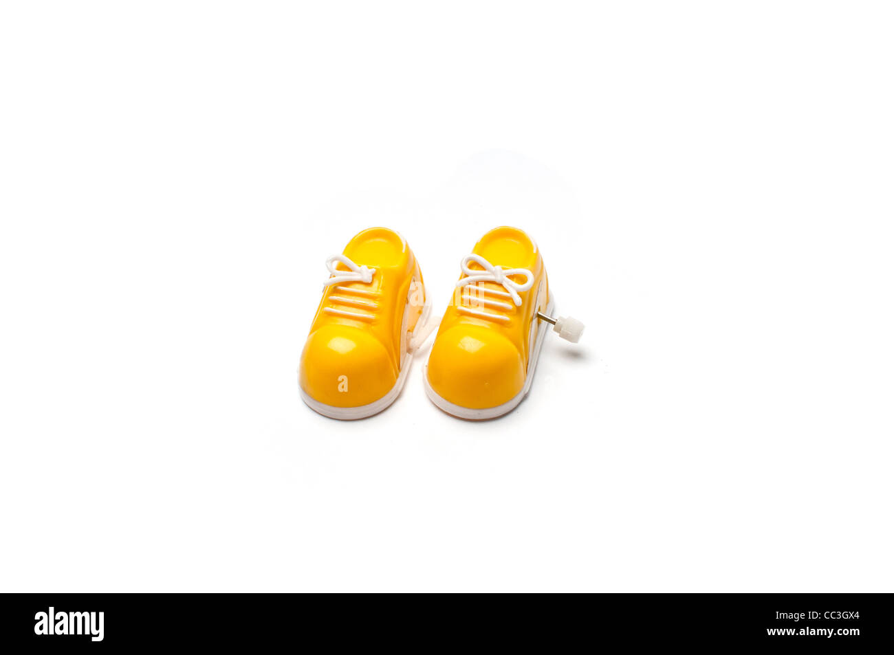A pair of wind up toy shoes Stock Photo - Alamy