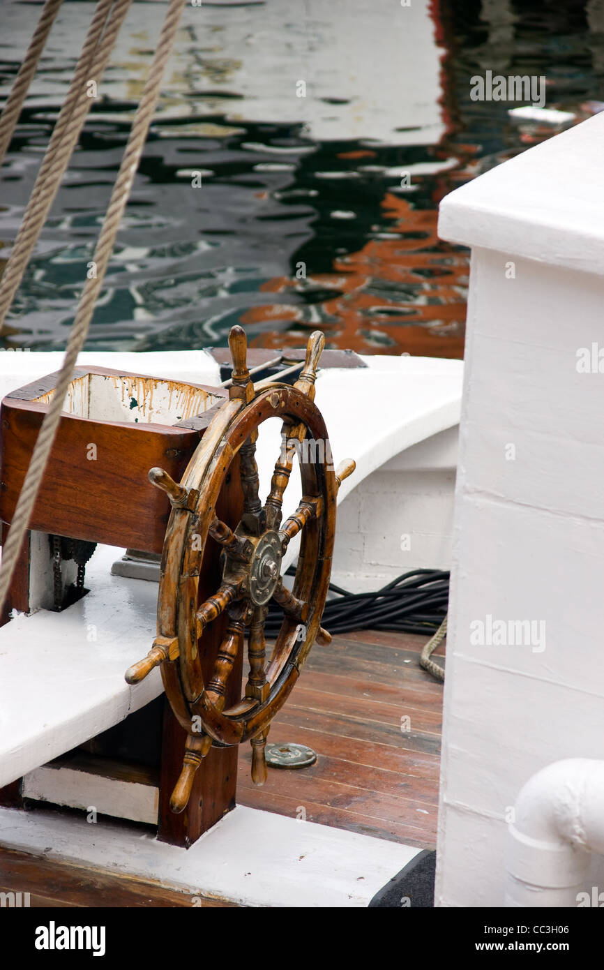 old wooden ship wheel Stock Photo - Alamy